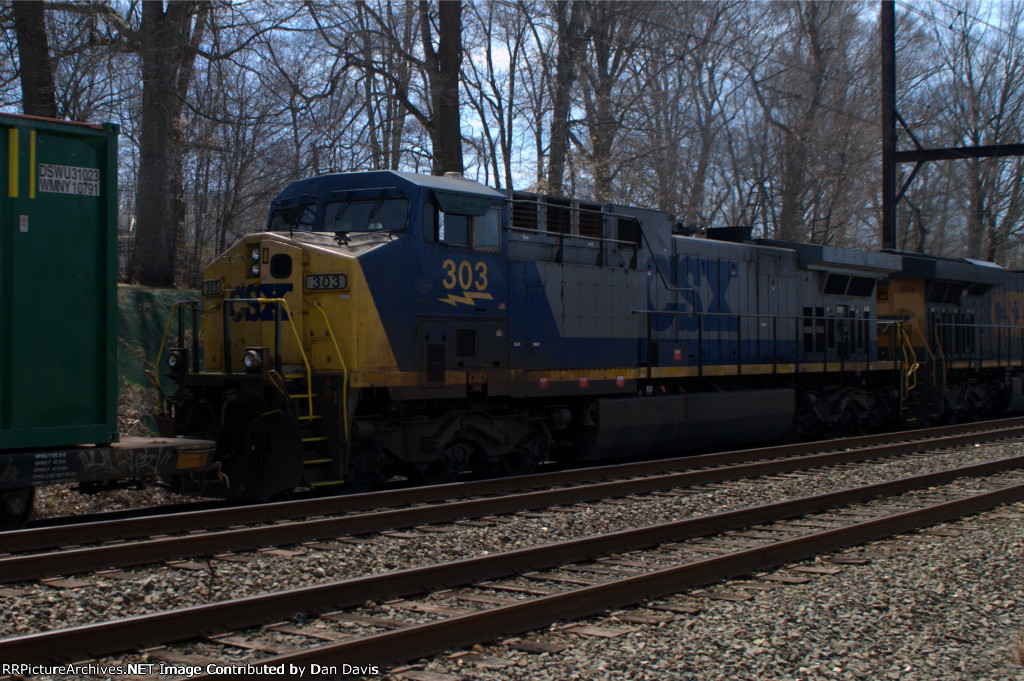 CSX AC44CW 303 trails on Q703-11